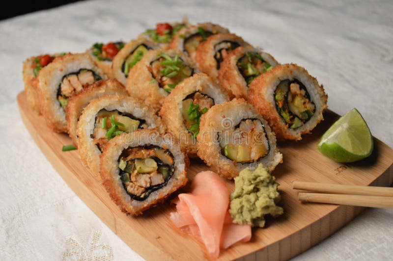 Delicious Fried Sushi Served in a Wooden Board Stockfoto - Bild von ...