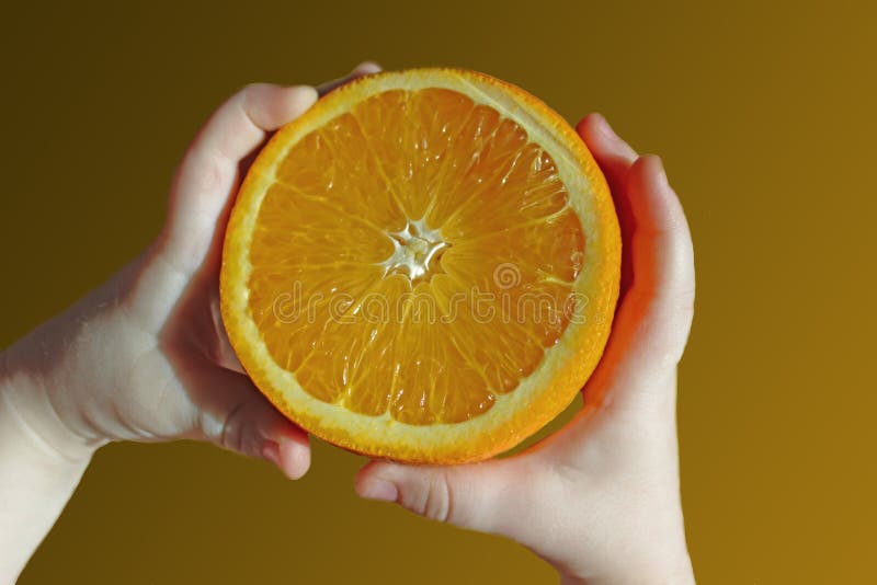 Orange in children s hands stock foto. Image of sappig - 52225174