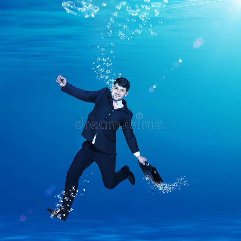 Businessman Sinking in Water Arkivfoto - Bild av panera, kläder: 67957914