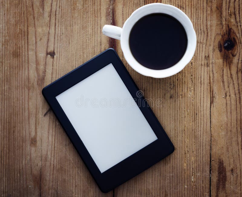 E-book reader and coffee stock image. Image of black - 40047855