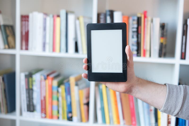 E-book Reader and Colorful Bookshelf Stock Photo - Image of colorful ...