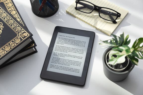 E-book Reader Device in Home Library Stock Photo - Image of paper ...