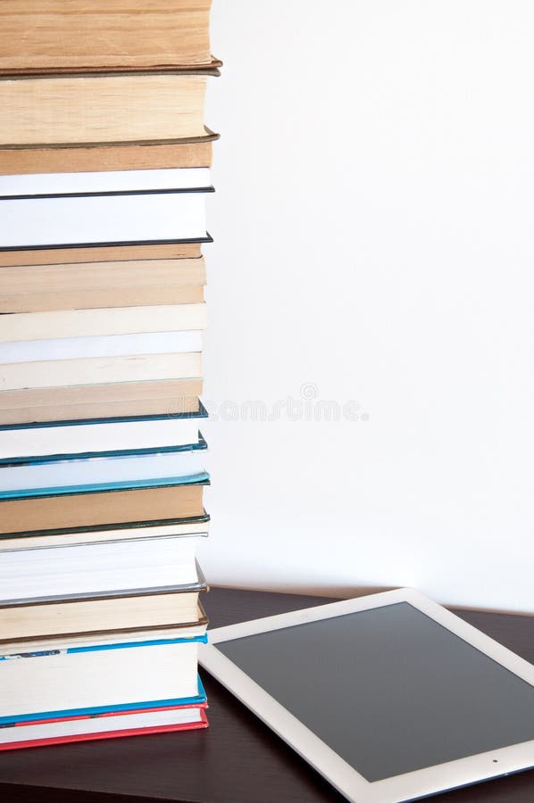 E-book Reader and Stack of Books Stock Image - Image of hightech ...