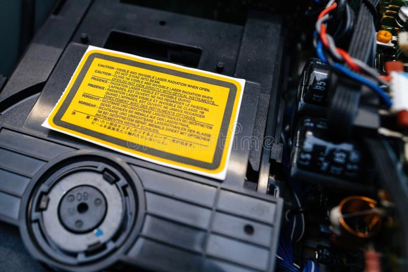 E: CD Player Internal Component with Caution Label Editorial Stock ...