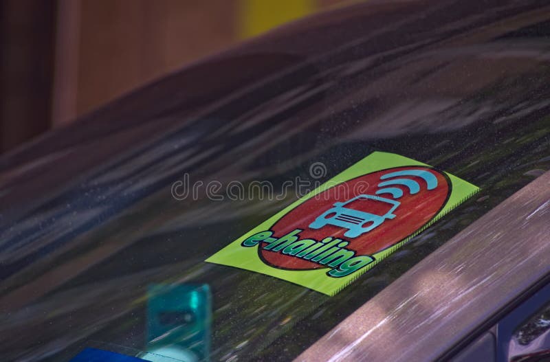 E-hailing Sticker on Front Car Windscreen Stock Image - Image of ride ...