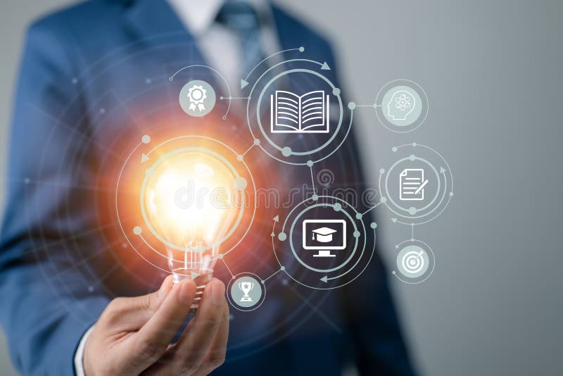 E-learning Concept with Person Holding a Light Bulb Stock Image - Image ...