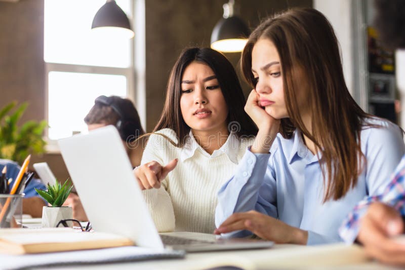 E-learning. Student Girls Using Laptop in Library Stock Photo - Image ...