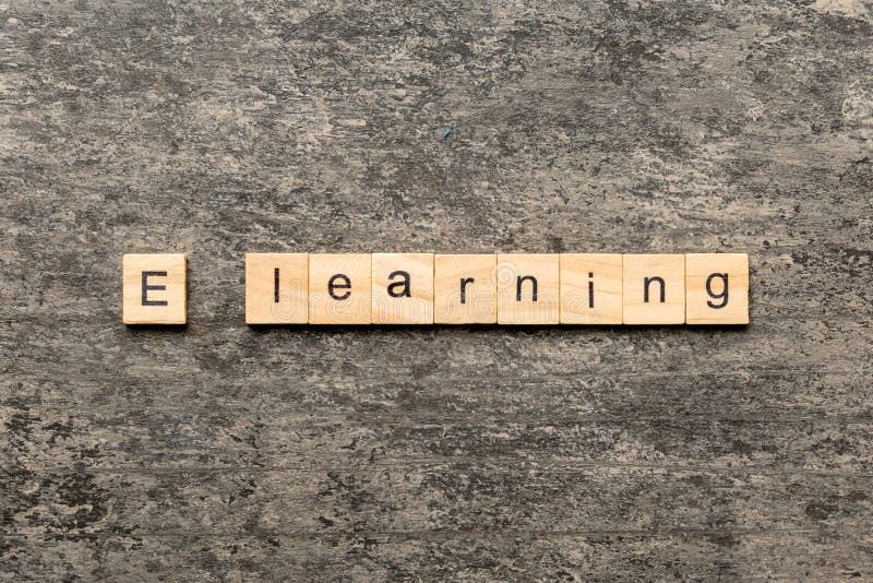 E Learning Word Written on Wood Block. Elearning Text on Cement Table ...