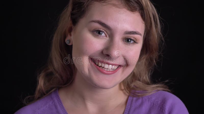 Close-up Portrait of Cute Woman Smiling into Camera Happily on Black ...