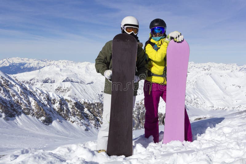 Two Young Happy Friends Snowboarders are Having Fun on Ski Slope with ...