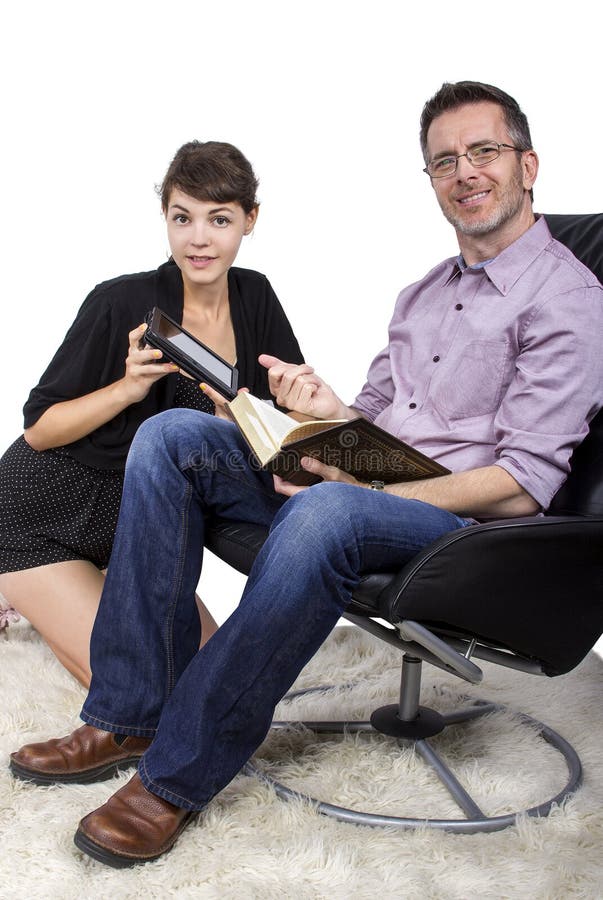 E Reader Versus Traditional Book Stock Photo - Image of literacy, male ...