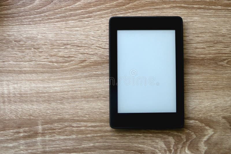 E-Reader on Wooden Background Stock Image - Image of contemporary, desk ...