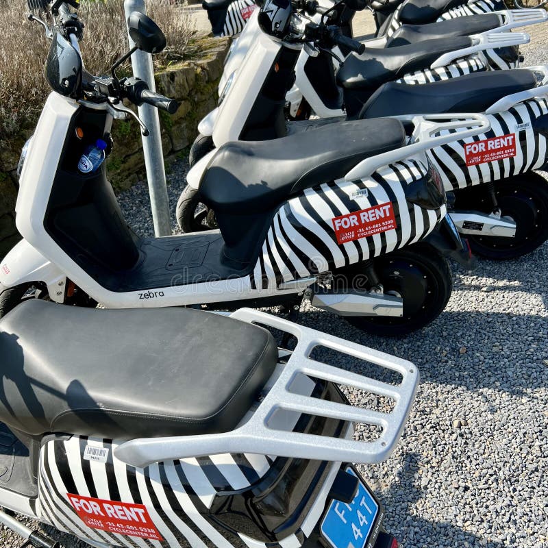 E-scooters for Rent by Cycle Center. Editorial Photo - Image of design ...