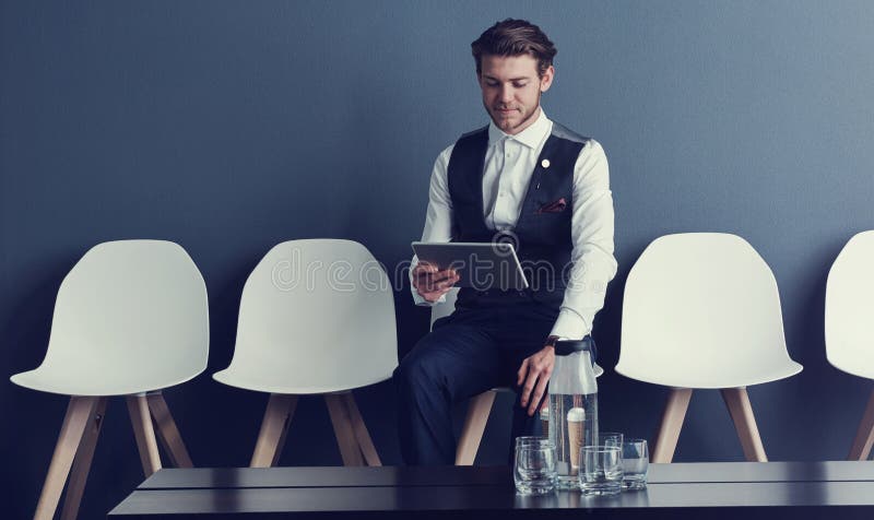 Eager for the Interview, Getting Tips Online. a Young Businessman Using ...