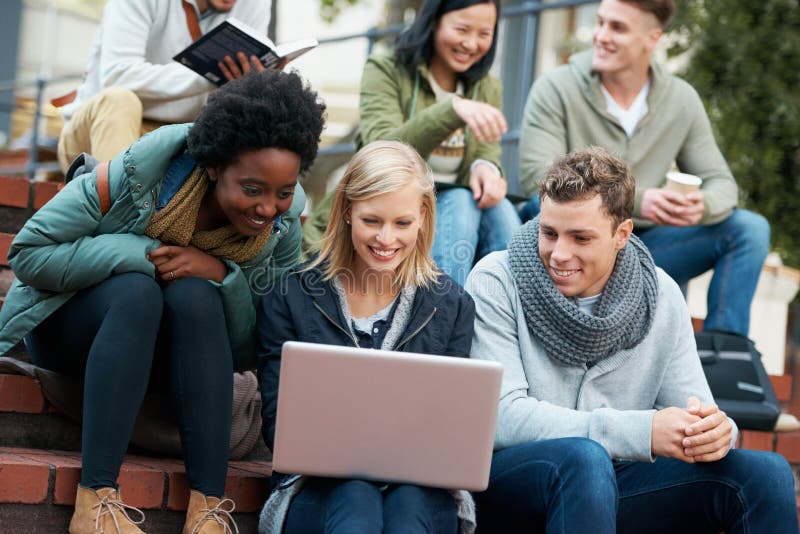 We are Eager To Learn. Shot of a Group of Smiling University Students ...