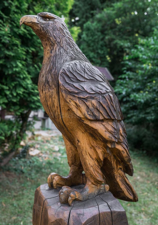 Eagle carved from wood. stock photo. Image of wings - 277708470