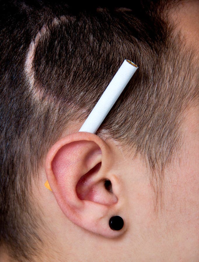 Ear with cigarette stock image. Image of face, young - 31078573