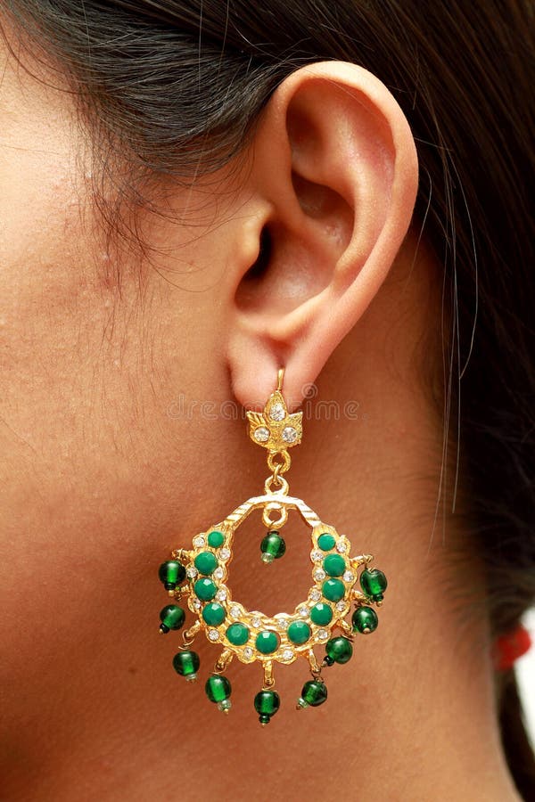 Ear with earring. stock photo. Image of jewelery, gold - 12724998