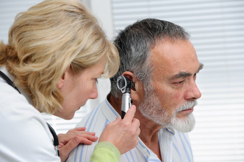 Ear exam stock image. Image of looking, female, care - 20264879