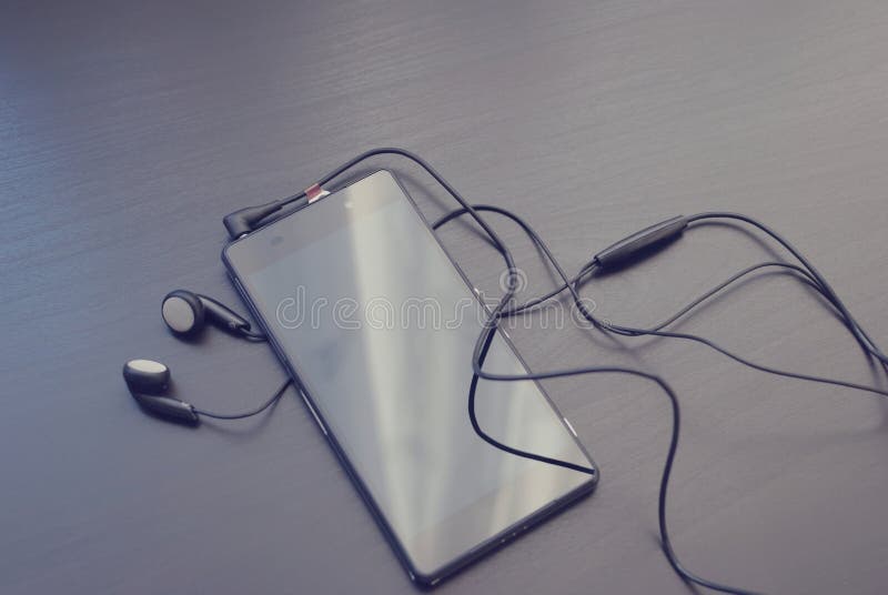 Ear Headphone & Smartphone Stock Photo - Image of player, portable ...