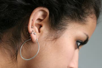 Ear piercing stock photo. Image of ethnic, pierced, beautiful - 325748