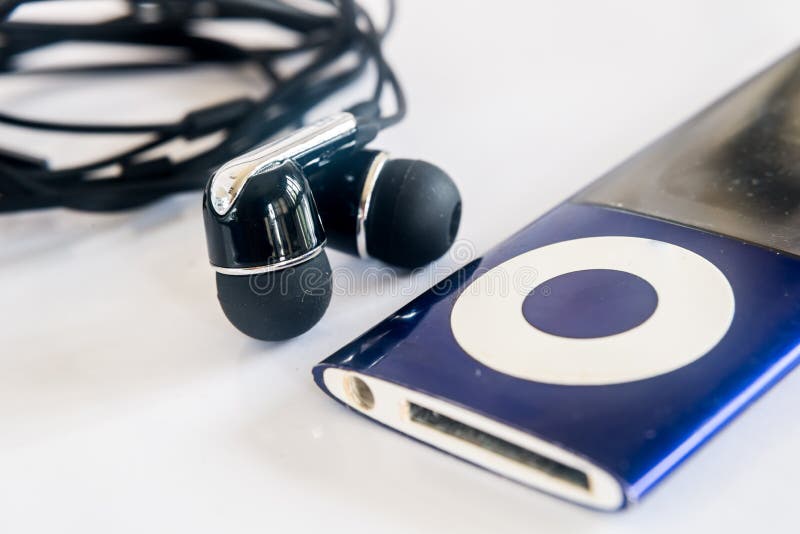 Ear Plug with the Music Player Stock Image - Image of equipment, listen ...