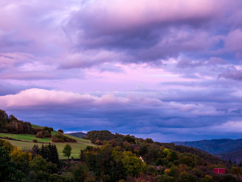 Early Evening Hilly Landscape with a Cloudy Sky in Autumn Stock Photo ...