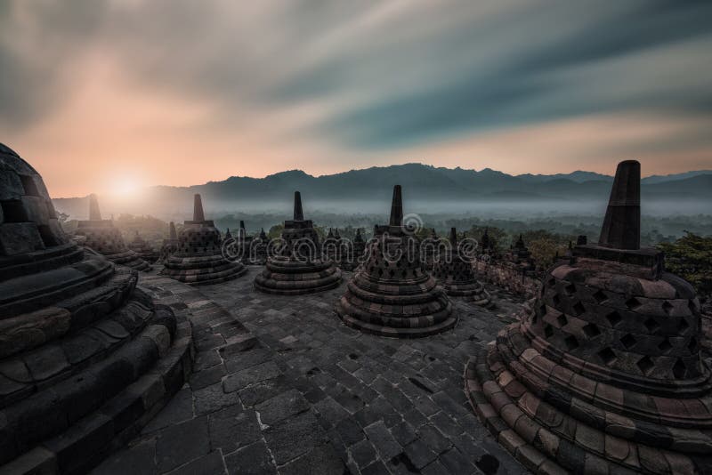 Borobudur Sunrise stock photo. Image of ritual, ruin - 83704224