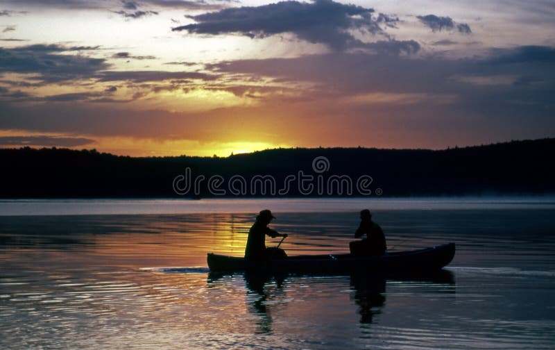 Early Morning Canoe Outing stock image. Image of pond - 4714125
