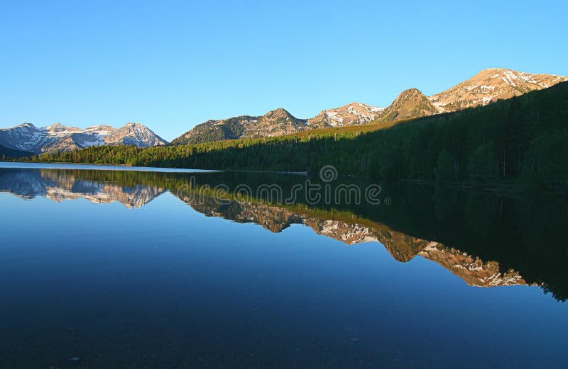 Early Morning Reflections stock photo. Image of mountains - 2535094
