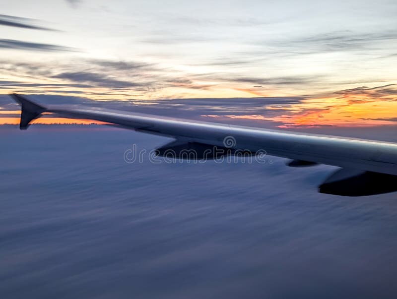 Early Morning Sunrise from an Airplane Stock Image - Image of machine ...