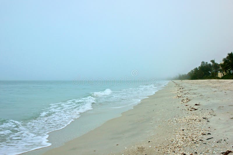Early Morning Tides Rolls Up on Beach Stock Photo - Image of florida ...