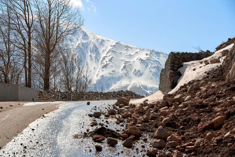 Early Spring in the Mountains. the Rocks Fell on the Road. Dangerous ...