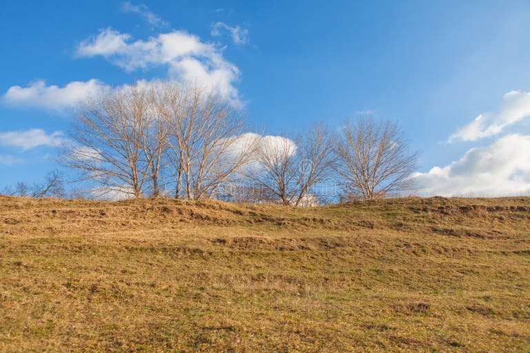 Early spring scenery stock image. Image of hill, clouds - 82334979