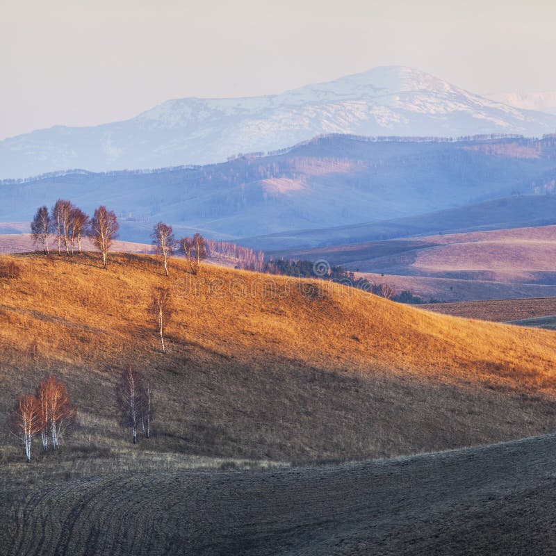 Early Spring, Sunset Light on Hillsides and Mountain Stock Image ...
