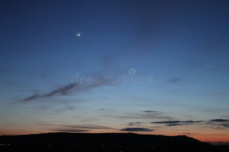 The Sun is Down, but the Moon is Still Up Stock Image - Image of still ...