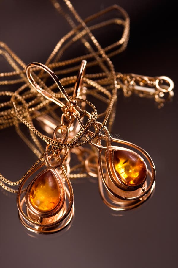 Earrings with Precious Amber Stock Photo - Image of luxury, gold: 11194094