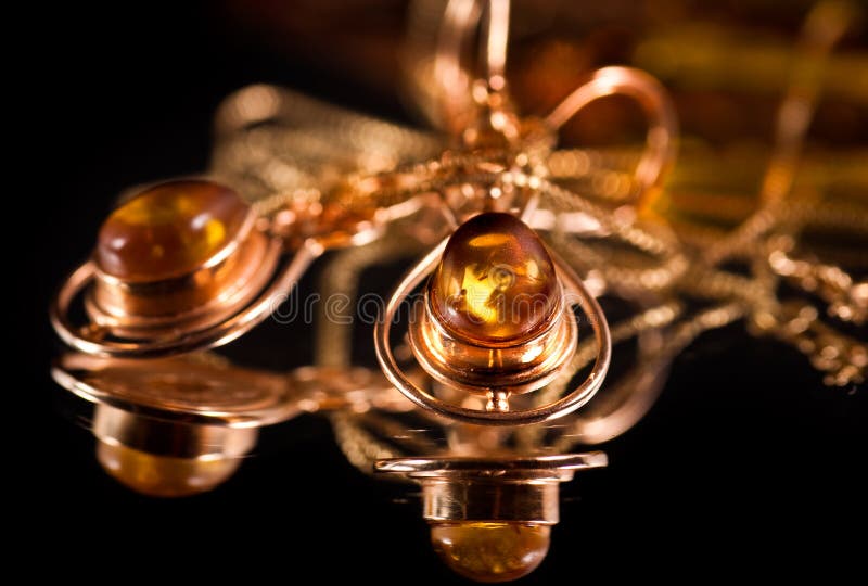 Earrings with Precious Amber Stock Photo - Image of reflection, macro ...