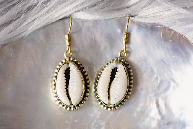 Earrings with Sea Shells in Brass Decorative Oval Stock Photo - Image ...