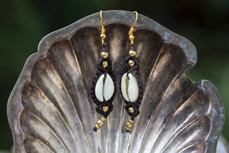 Earrings with white shells stock photo. Image of bohemian - 202395370