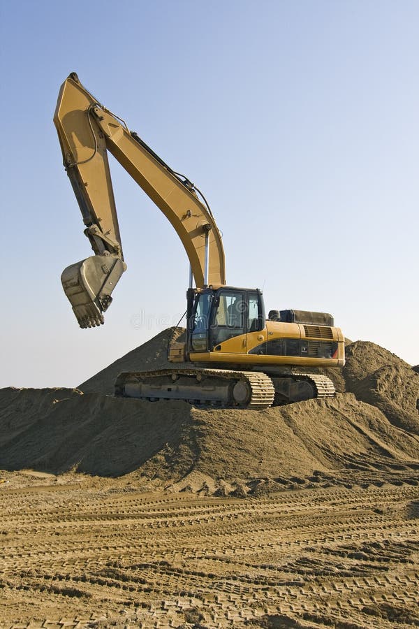 Earth digger at work stock photo. Image of building, power - 16848844