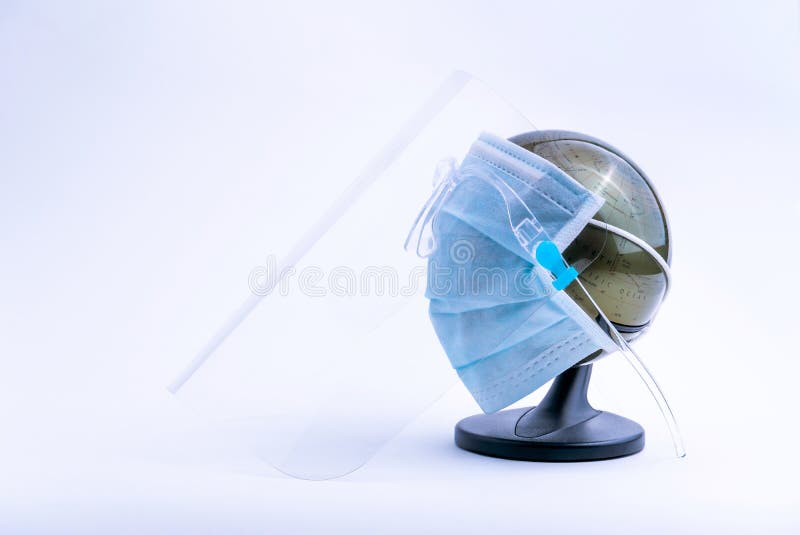 Earth Globe with Medical Disposable Face Mask and Face Shield Stock ...