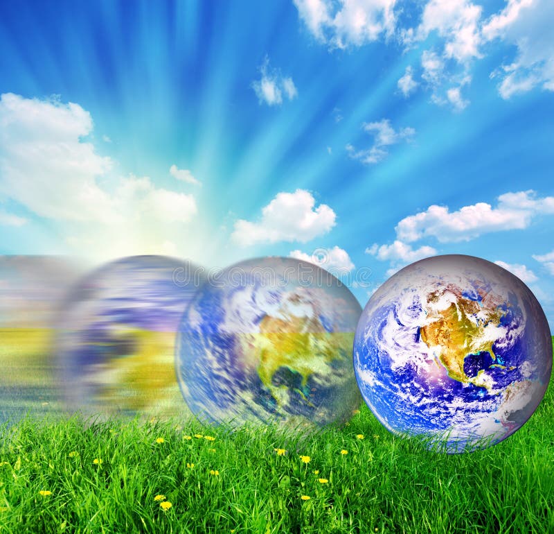 Earth Globe Rolling on Green Grass Stock Photo - Image of clean, globe ...