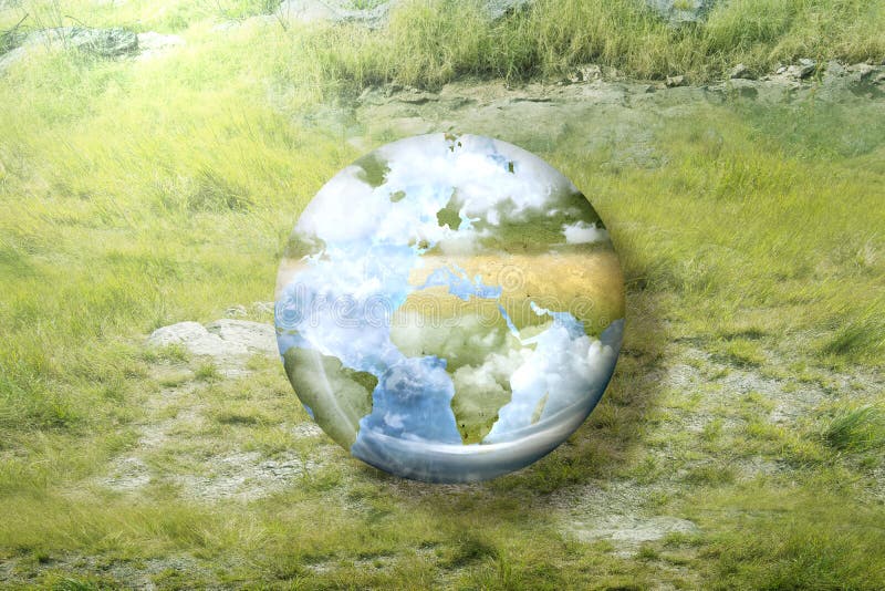 Earth on the grass stock image. Image of planet, nature - 239173583