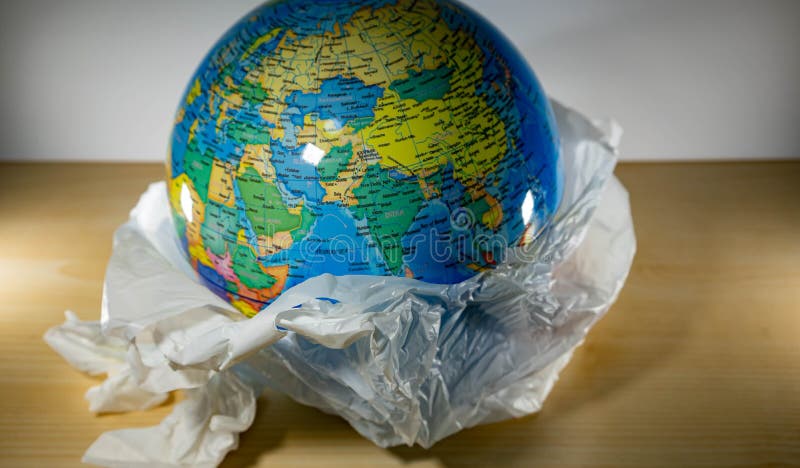 Earth Inside a Plastic and Some Garbage. Earth is Being Destroyed ...