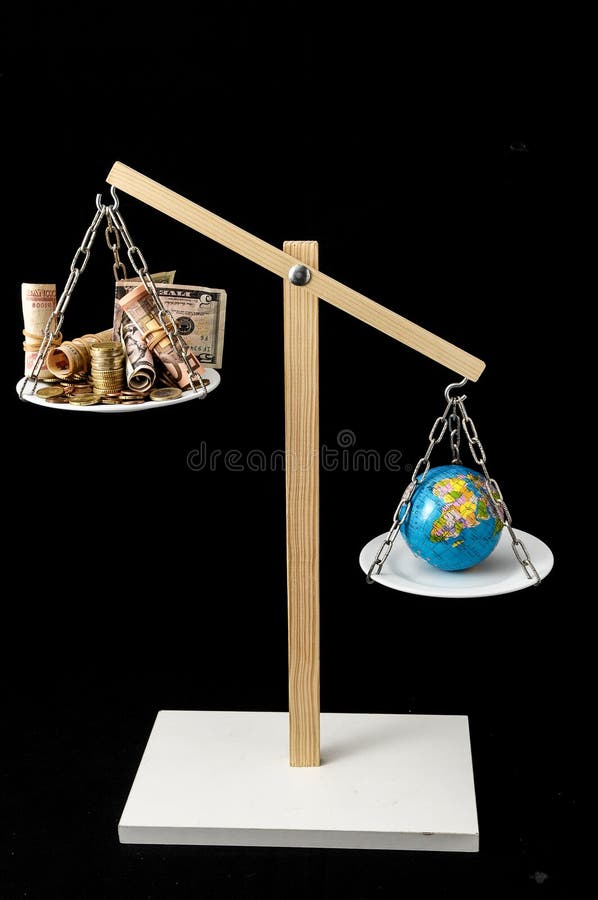 Earth and Money on a Two Pan Balance Stock Image - Image of business ...