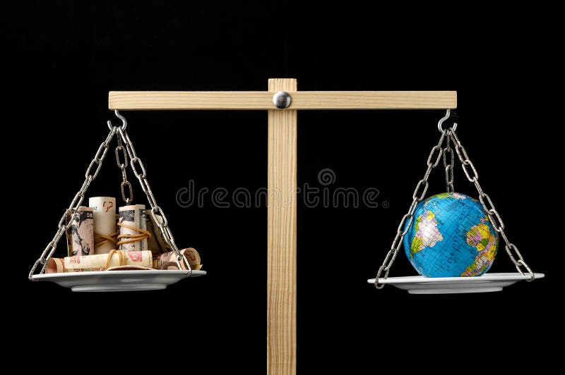Earth and Money on a Two Pan Balance Stock Image - Image of ...