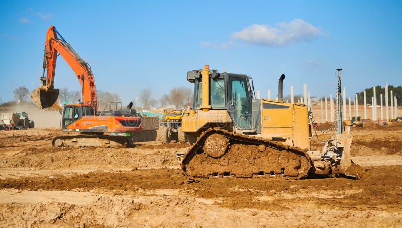 Earth Mover Bulldozer and Excavator at Construction Site Stock Image ...