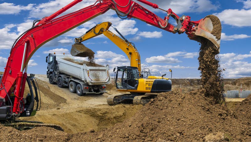 Earth Mover and Excavator at Work in Construction Site Stock Photo ...