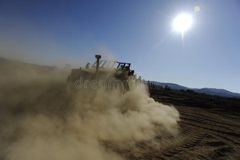 Earth-mover making dust stock photo. Image of power, heavy - 11085234